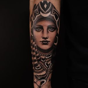 Regino Gonzales a.k.a RG produces tattoos that are creative gold