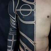 Nissaco's tattoo work rides the crosshairs of optical illusion and reality