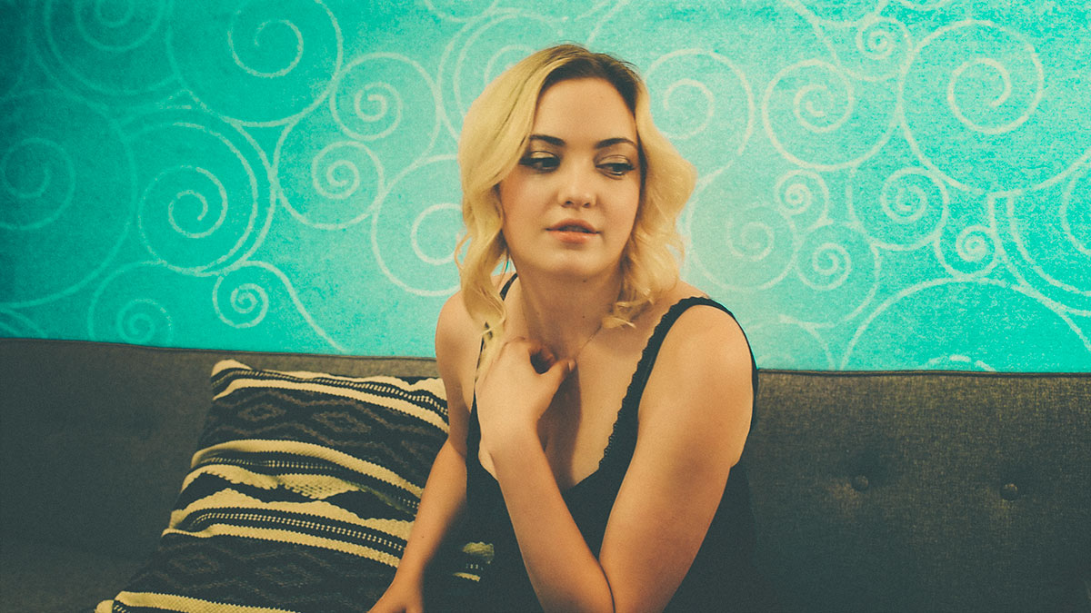 Carrie Lane tells the story of her new EP, faces her demons.